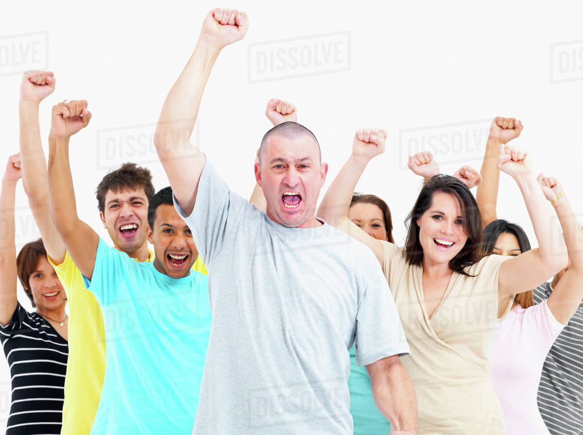 Group of people cheering - Stock Photo - Dissolve