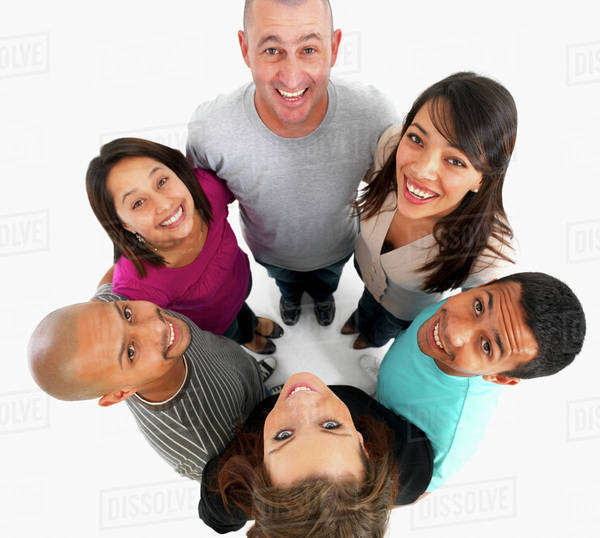 Friends standing in a circle - Stock Photo - Dissolve