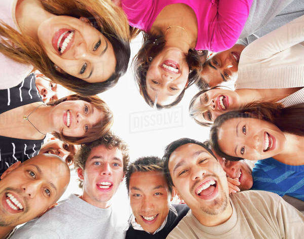 People standing in a circle - Stock Photo - Dissolve