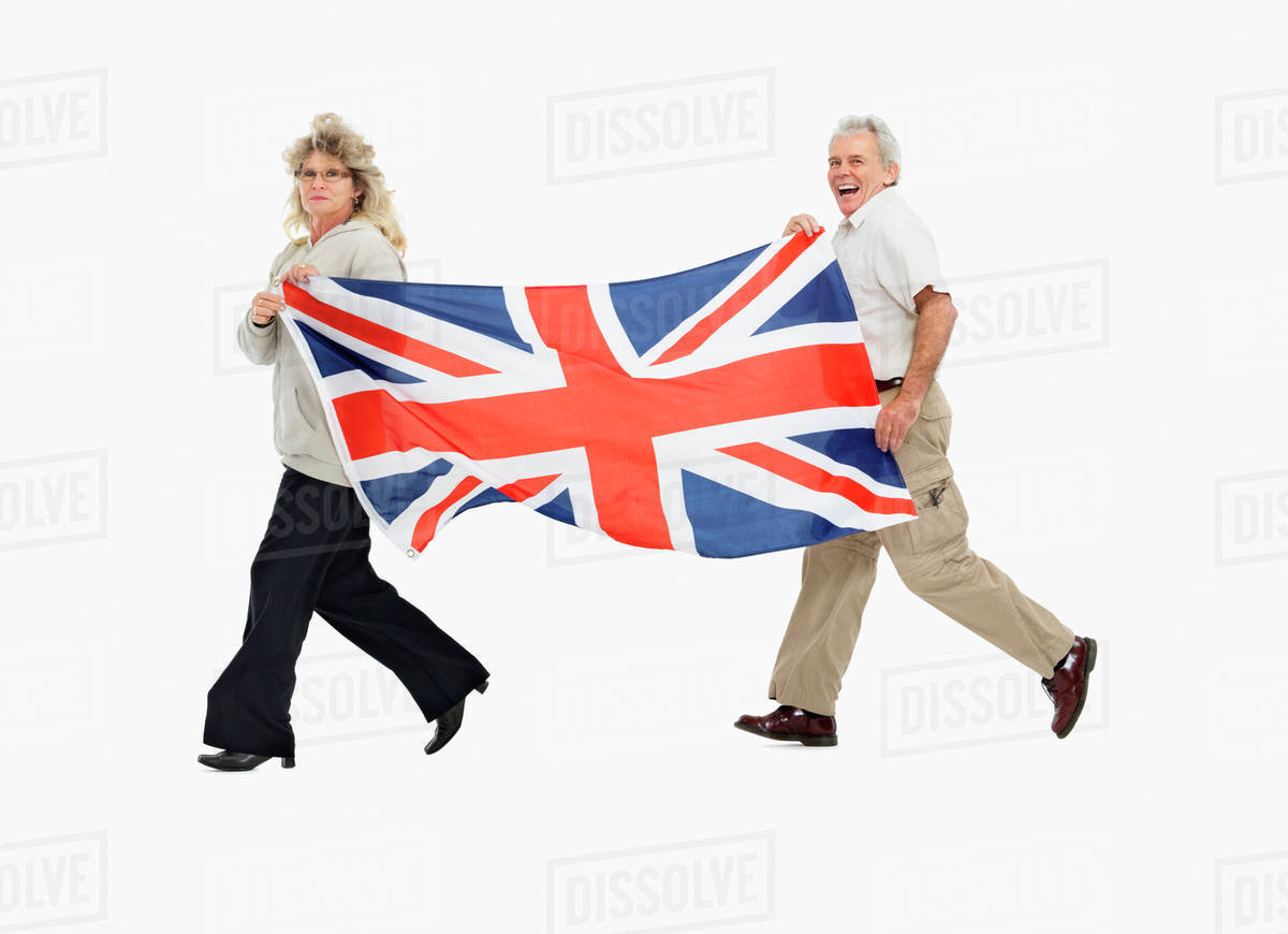 Two people carrying the British flag - Royalty-free Stock Photo | Dissolve