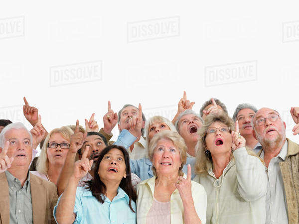 A group of shocked people pointing up - Royalty-free Stock Photo | Dissolve