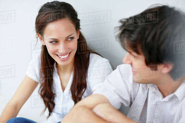 Two people talking - Royalty-free Stock Photo | Dissolve