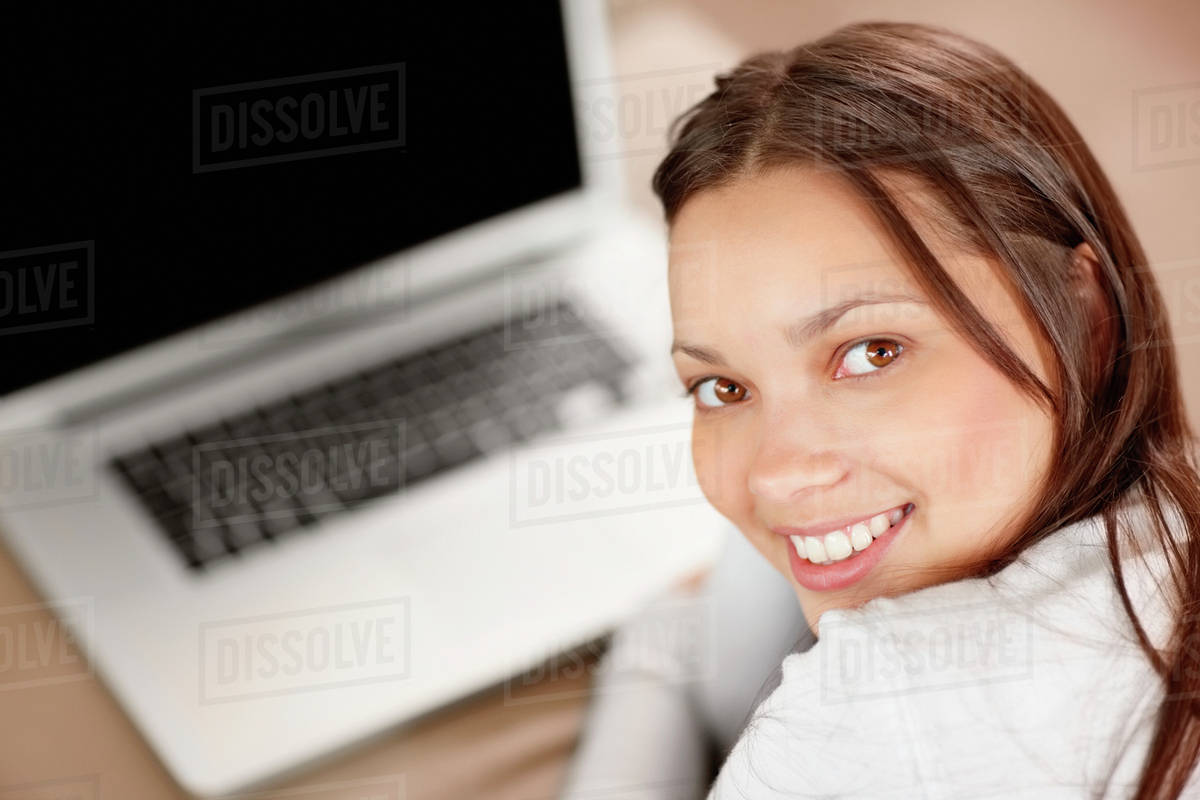 Woman browsing the internet - Royalty-free Stock Photo | Dissolve