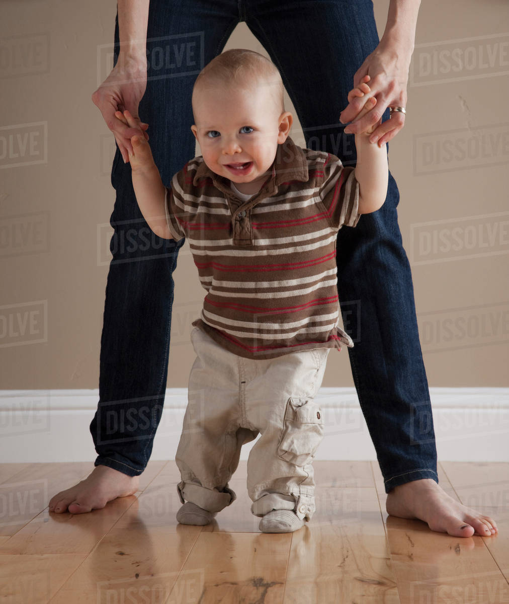 Toddler's first steps - Royalty-free Stock Photo | Dissolve