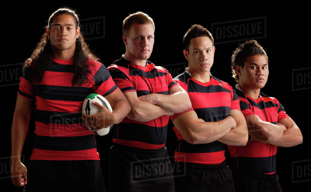 Studio portrait of male rugby team - Royalty-free Stock Photo | Dissolve