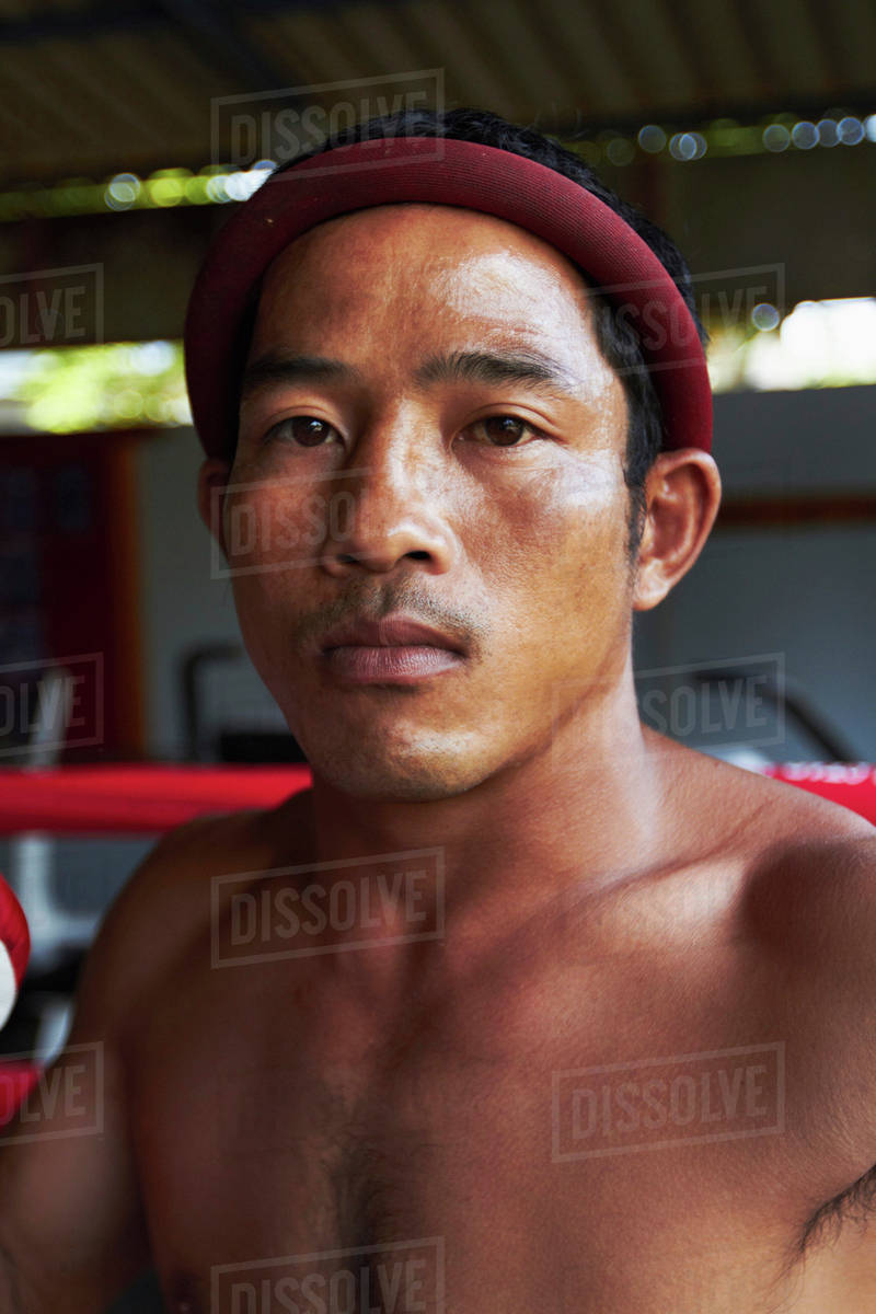 Portrait of mid adult male boxer - Royalty-free Stock Photo | Dissolve