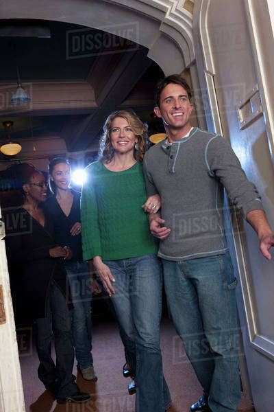 People exiting movie theatre - Royalty-free Stock Photo | Dissolve