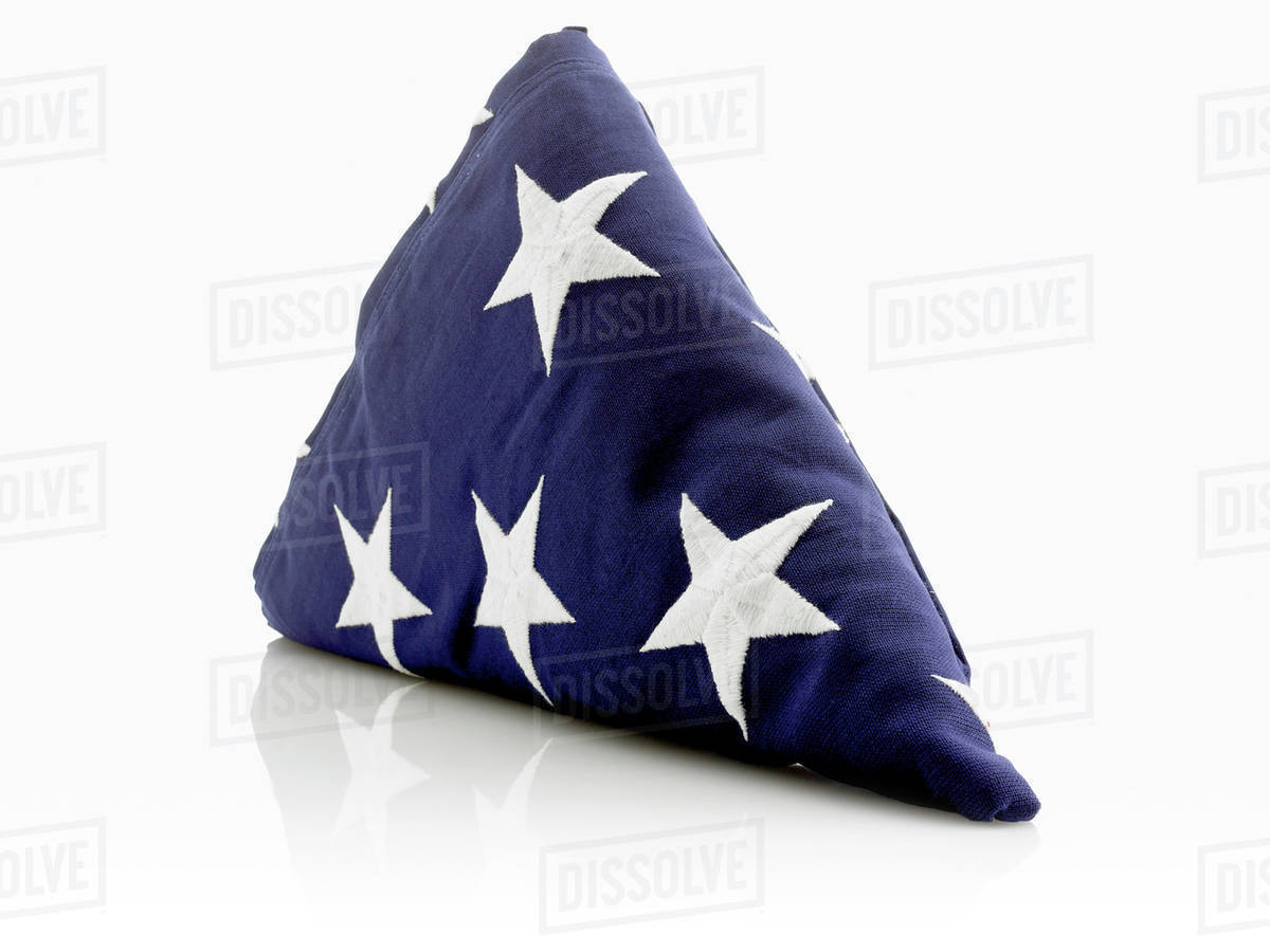 American flag folded in a triangle - Royalty-free Stock Photo | Dissolve