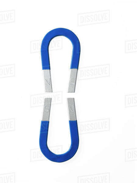 Two blue magnets - Royalty-free Stock Photo | Dissolve