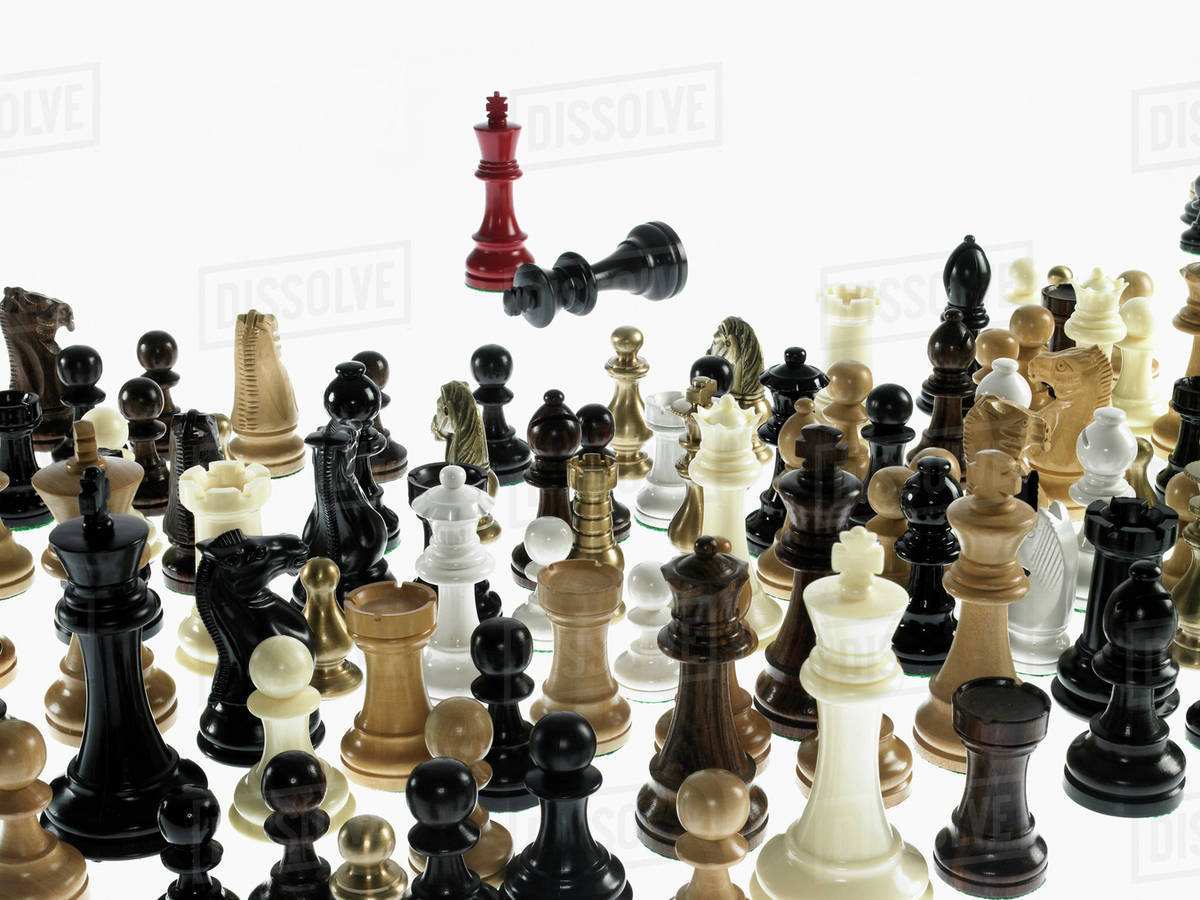 Group of chess pieces watching kings fighting - Stock Photo - Dissolve