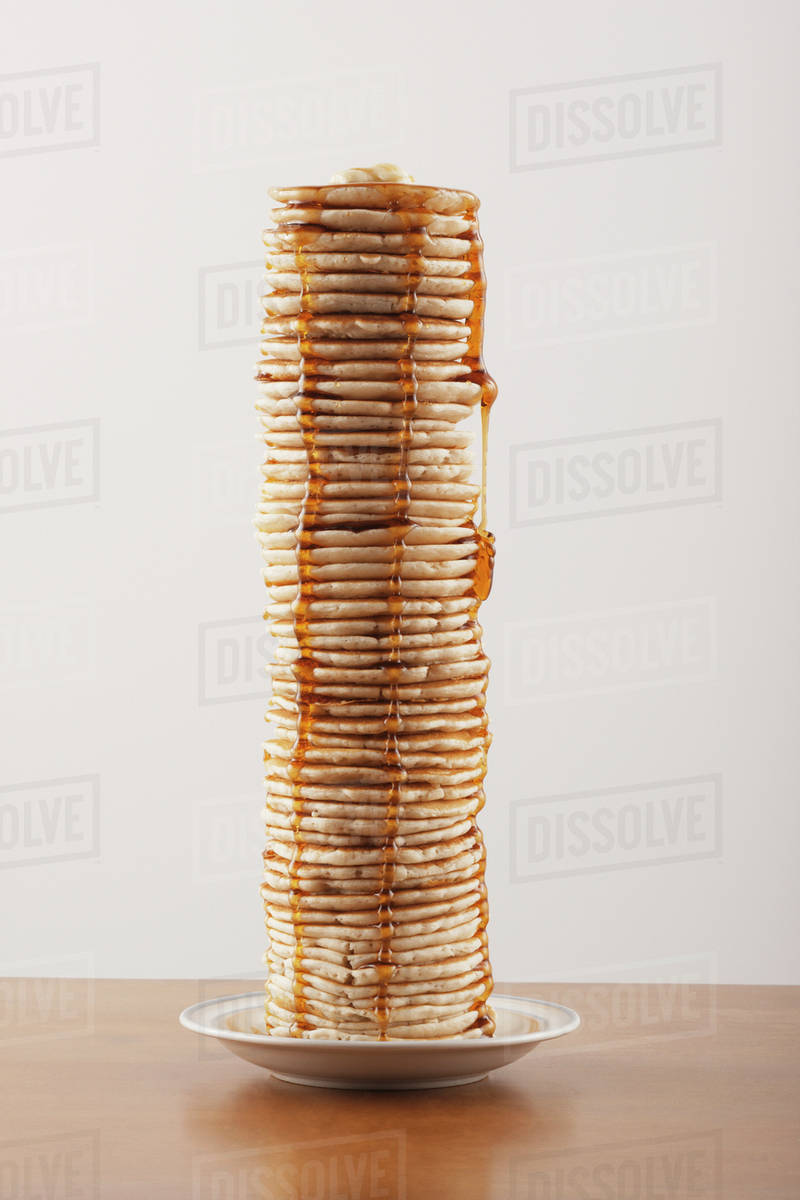 Tall stack of pancakes - Stock Photo - Dissolve