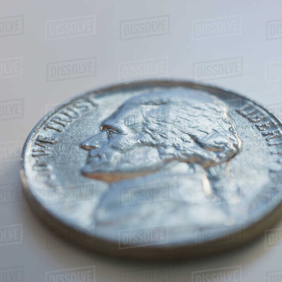 Close up of silver coin - Royalty-free Stock Photo | Dissolve