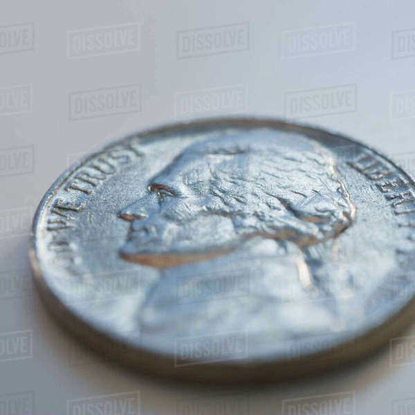 Close up of silver coin - Royalty-free Stock Photo | Dissolve