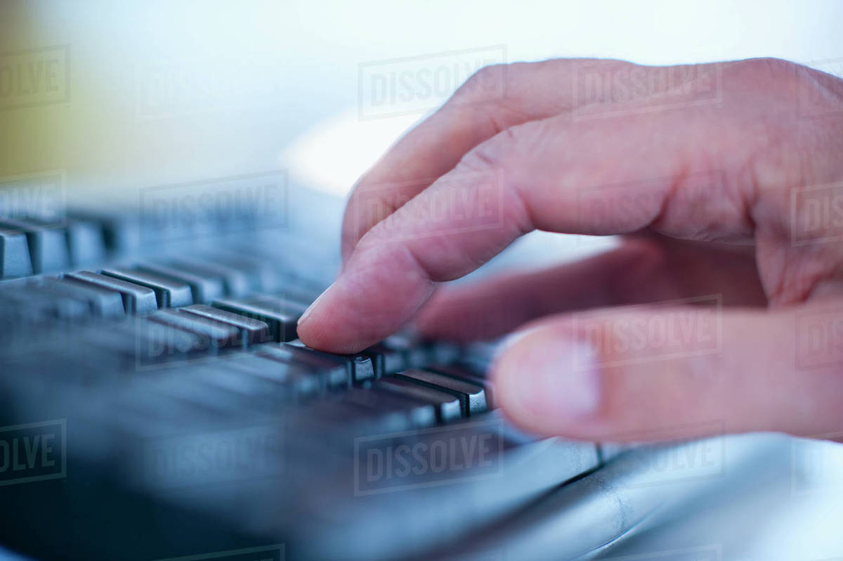 hand-typing-on-a-computer-keyboard-stock-photo-dissolve