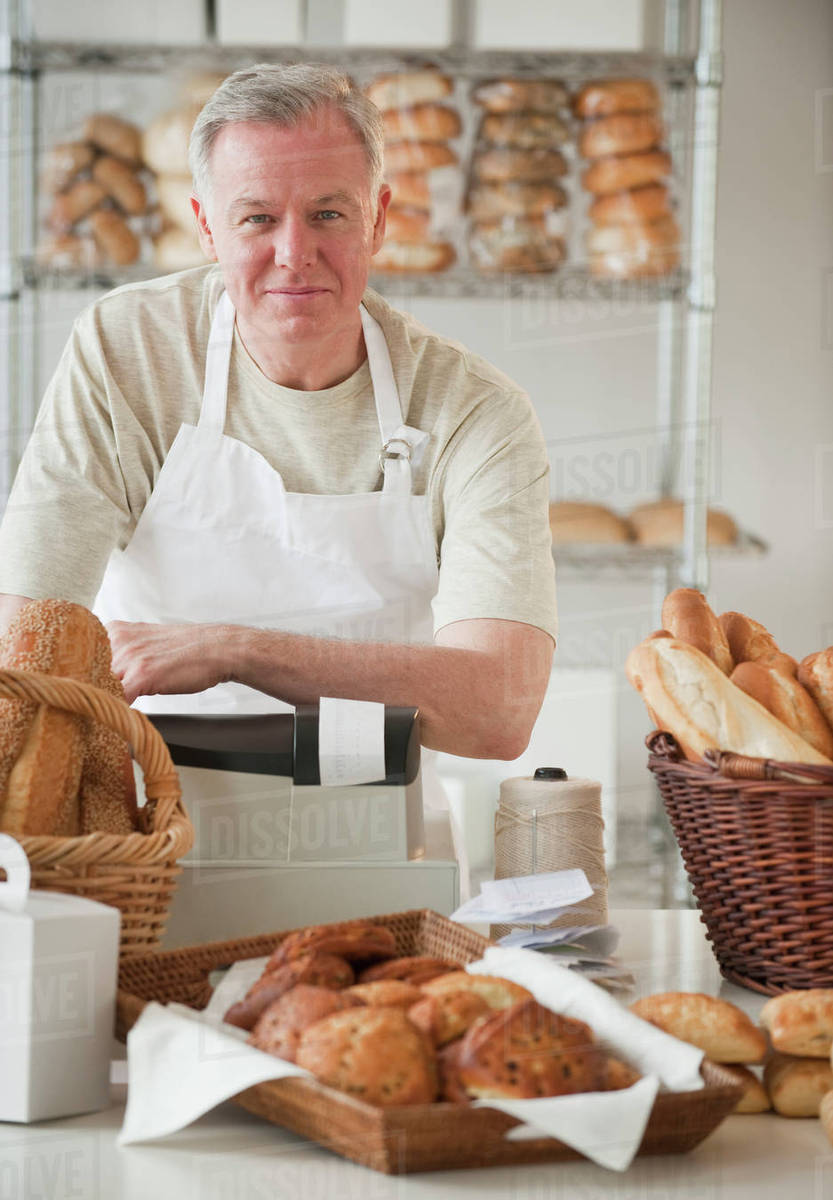 A baker in a bakery - Royalty-free Stock Photo | Dissolve