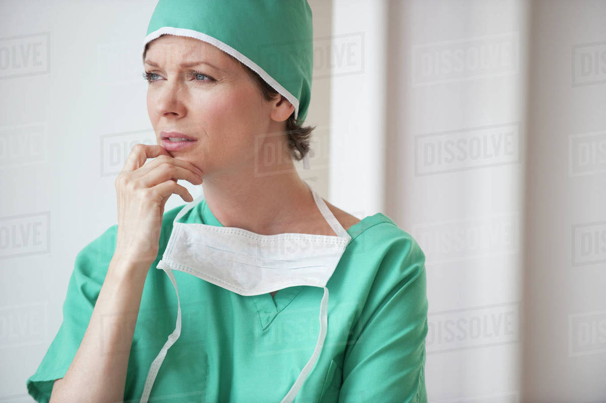 Female doctor looking concerned - Stock Photo - Dissolve