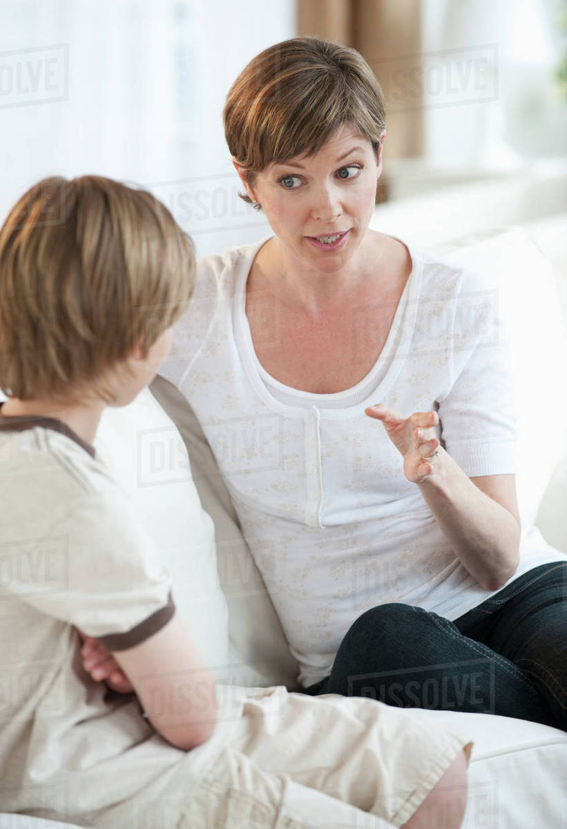 Mother and child talking - Royalty-free Stock Photo | Dissolve