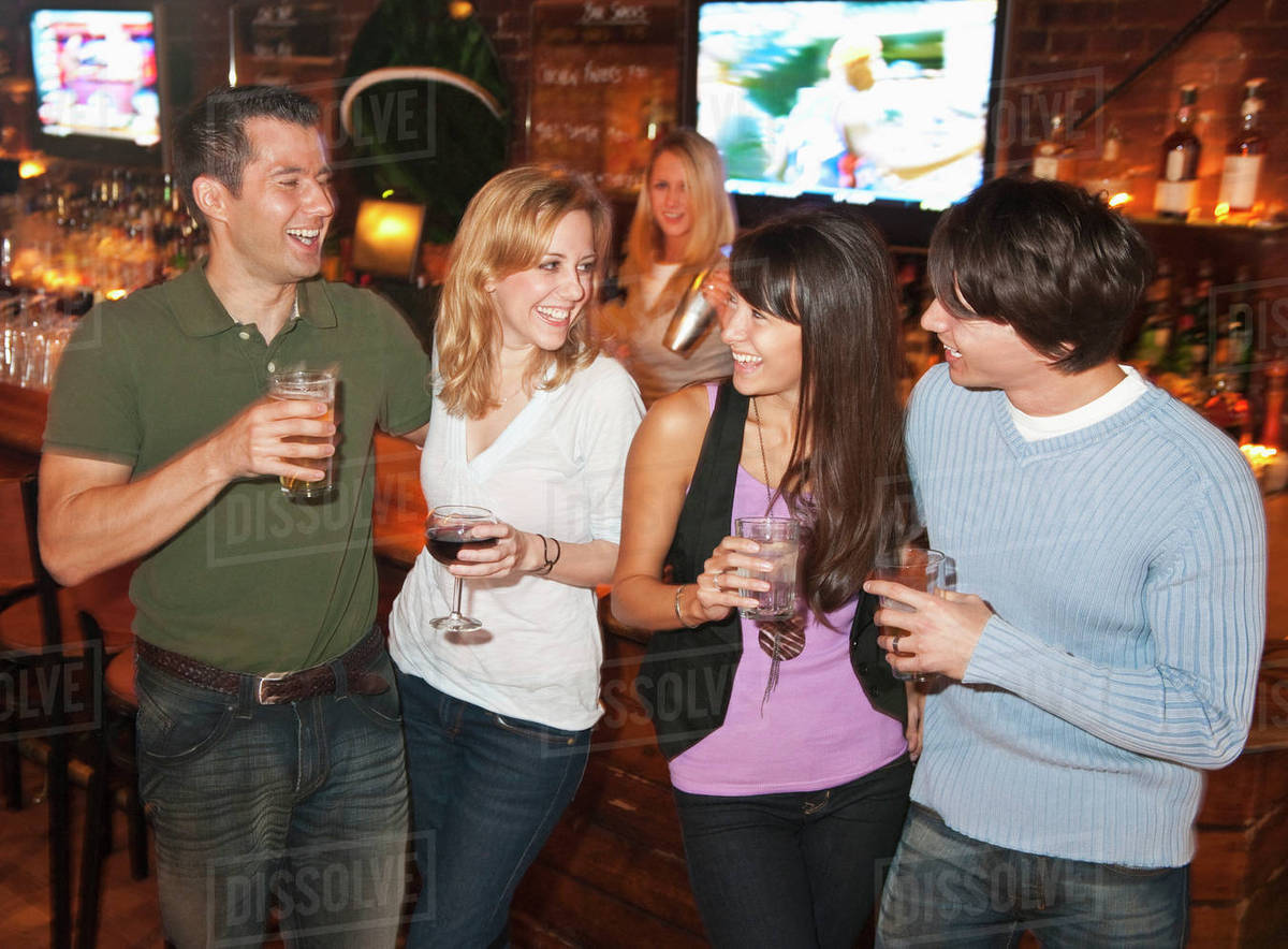 Friends at bar - Royalty-free Stock Photo | Dissolve