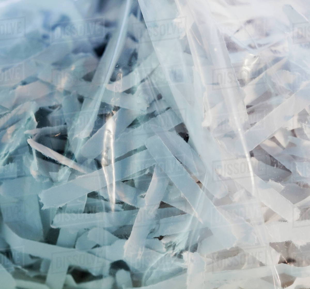 Shredded paper in plastic bag - Royalty-free Stock Photo | Dissolve