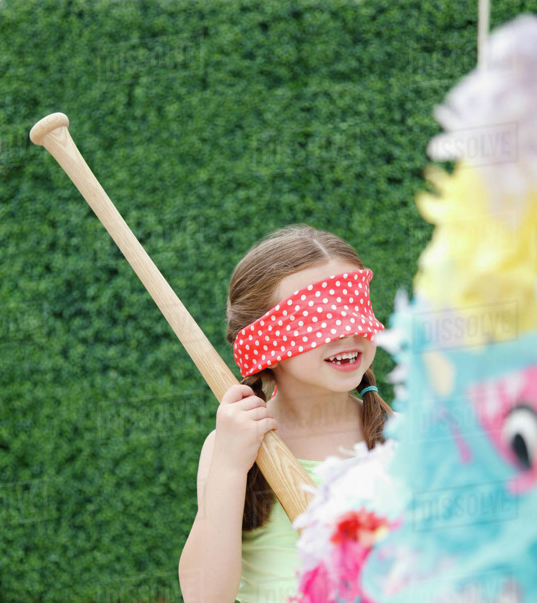 Child with pinata - Stock Photo - Dissolve
