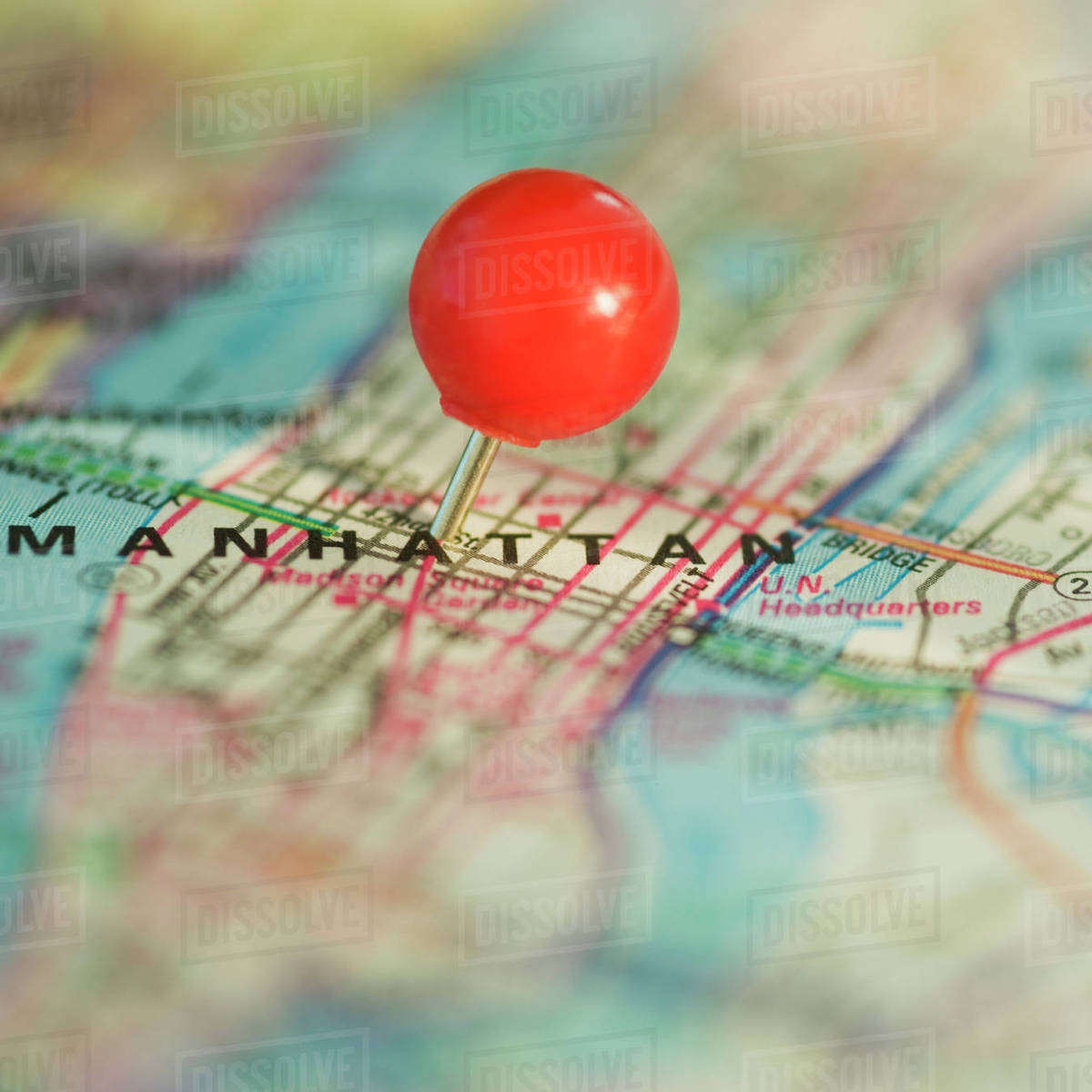 Close up of pin on map location - Royalty-free Stock Photo | Dissolve