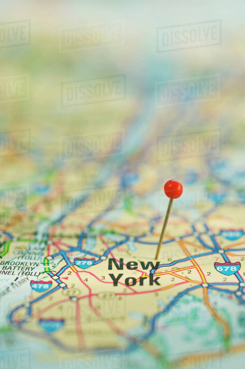 Close up of pin on map location - Royalty-free Stock Photo | Dissolve