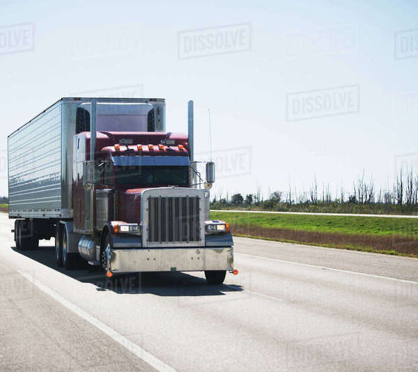 Semi truck on highway - Stock Photo - Dissolve