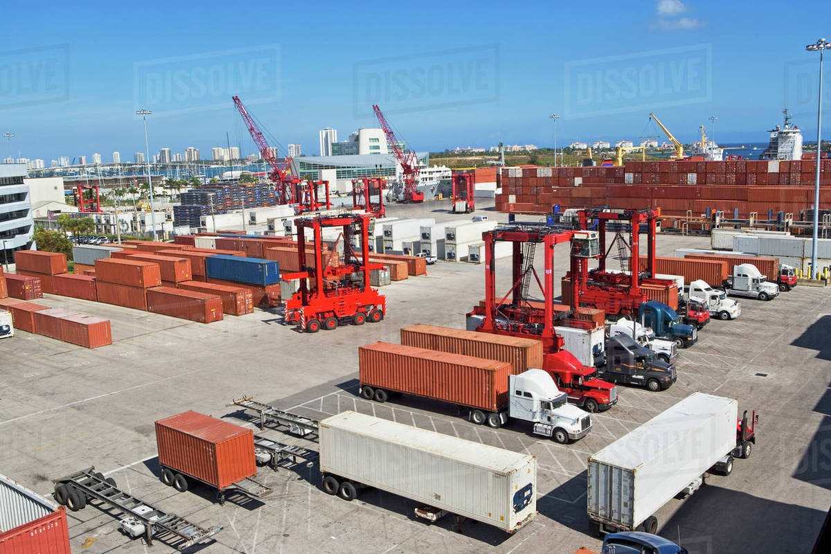 Shipping containers at dock - Stock Photo - Dissolve