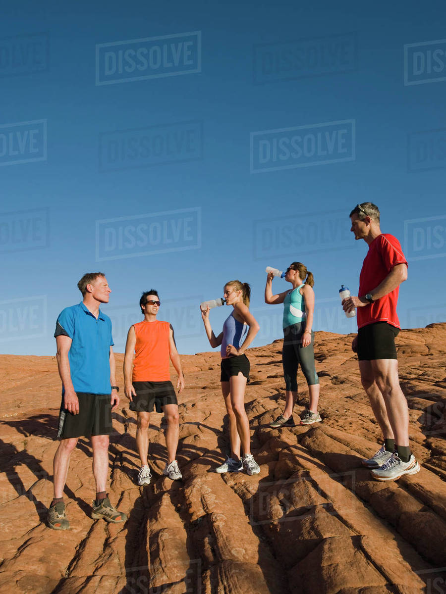 Runners at Red Rock taking a break - Stock Photo - Dissolve