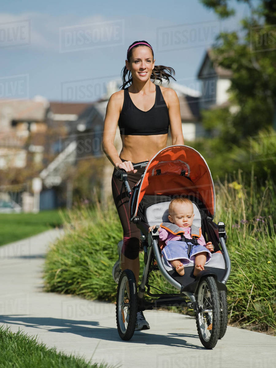 Jogger and baby - Stock Photo - Dissolve