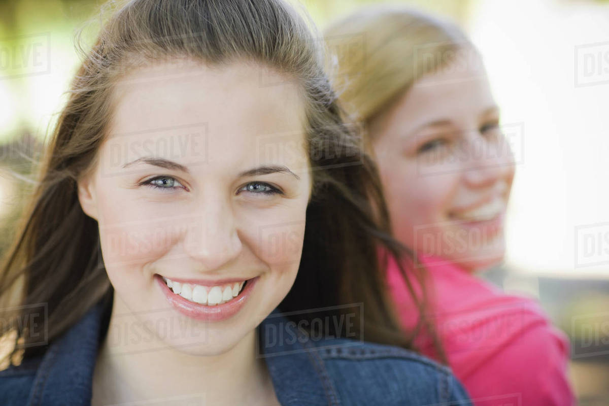 Two sisters outdoors - Royalty-free Stock Photo | Dissolve