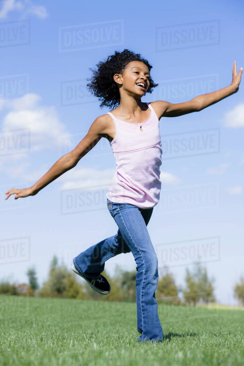 Girl running - Royalty-free Stock Photo | Dissolve