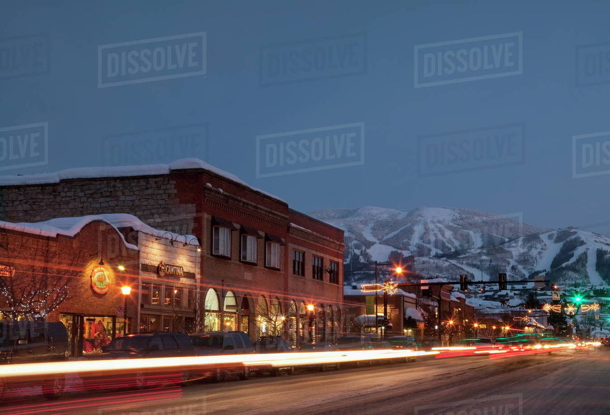 Steamboat Springs, Town at night with mountains in background ...