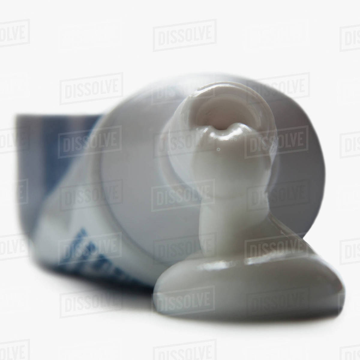 Open toothpaste tube - Stock Photo - Dissolve