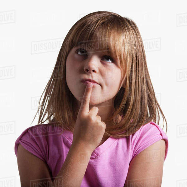 Portrait of young girl thinking - Royalty-free Stock Photo | Dissolve