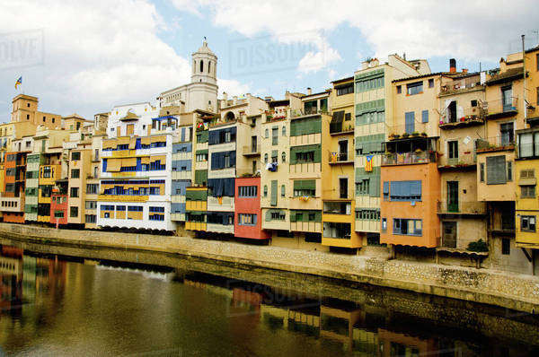 Houses facing river - Royalty-free Stock Photo | Dissolve