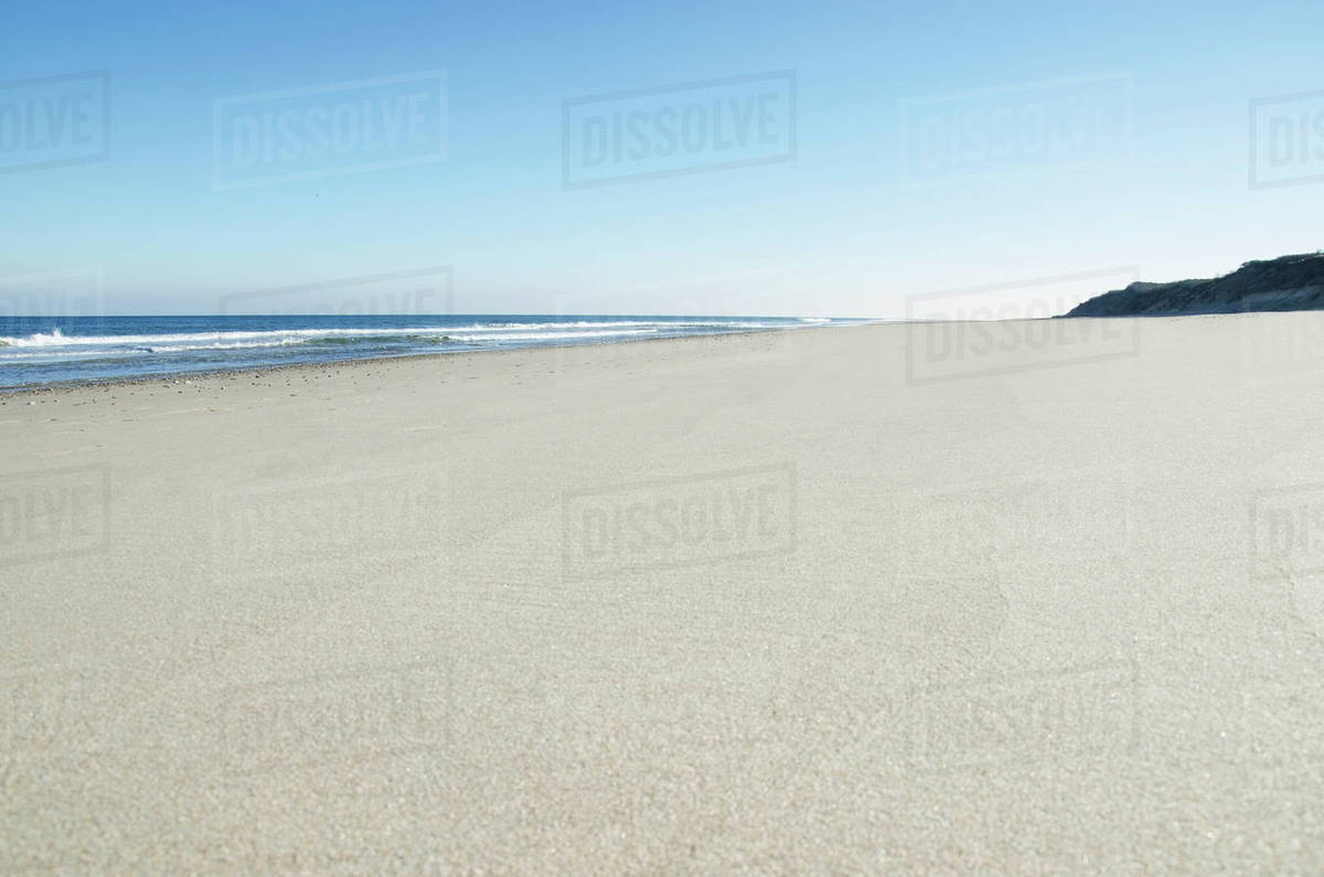 Empty beach on sunny day - Royalty-free Stock Photo | Dissolve