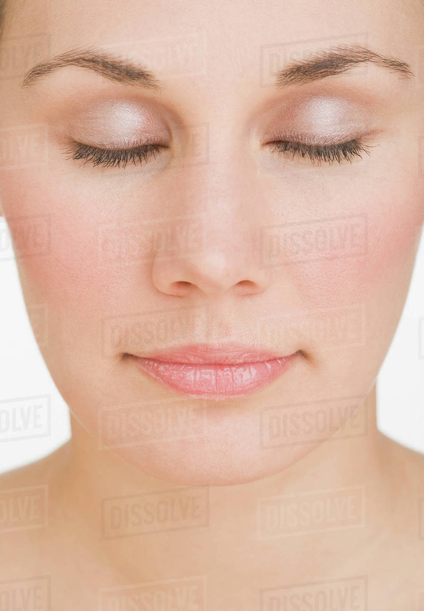 Close up of woman with eyes closed - Royalty-free Stock Photo | Dissolve