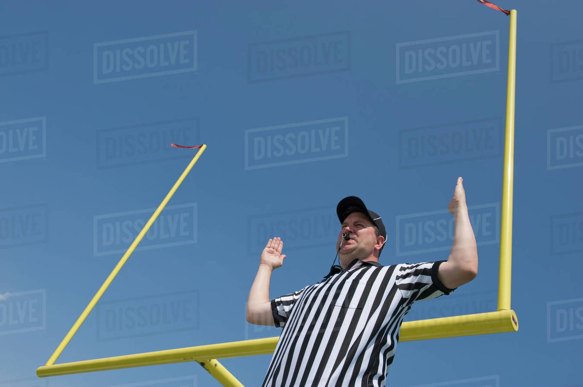 Football referee calling field goal - Royalty-free Stock Photo | Dissolve