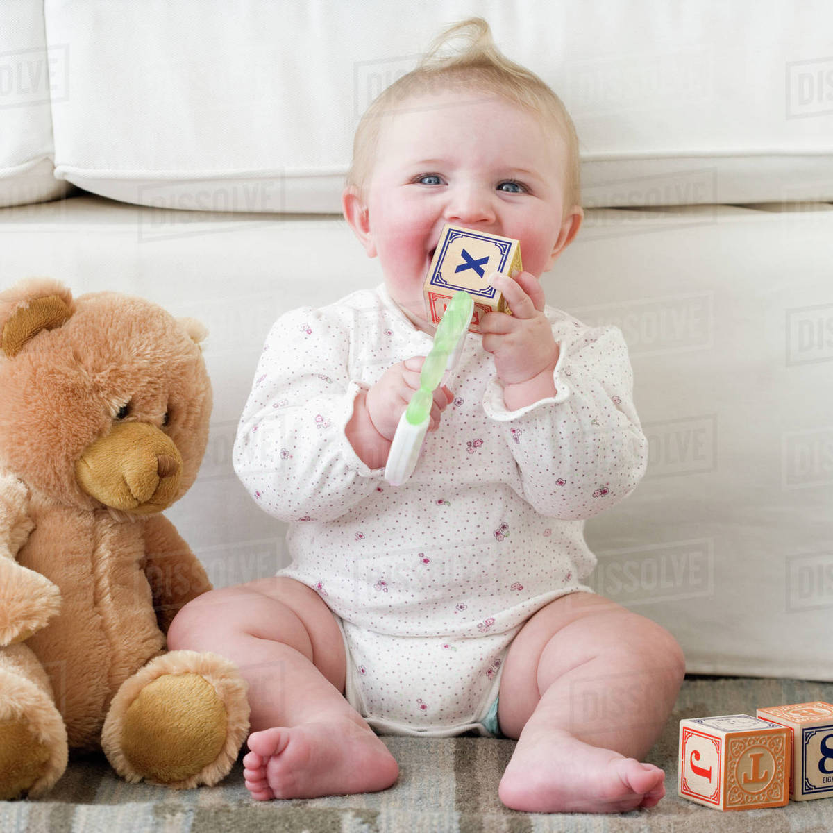 Baby playing with alphabet blocks - Royalty-free Stock Photo | Dissolve