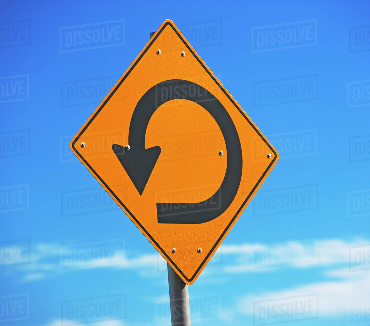 Round a bout sign, sign - Stock Photo - Dissolve