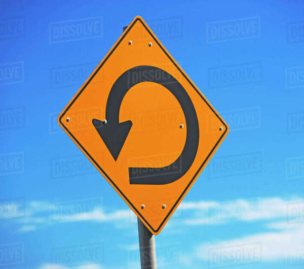 Round a bout sign, sign - Stock Photo - Dissolve
