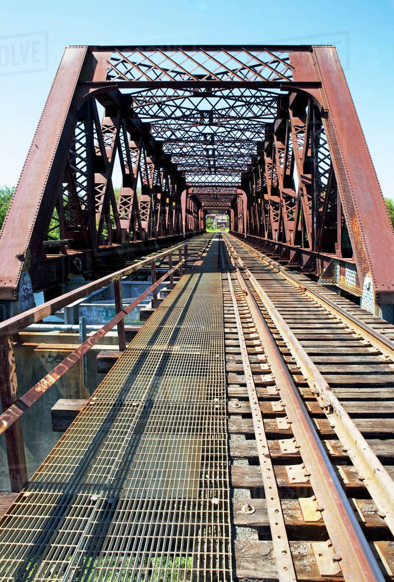 Steel railroad bridge - Stock Photo - Dissolve
