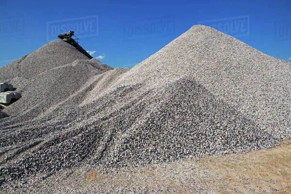 Gravel mounds at concrete plant - Royalty-free Stock Photo | Dissolve