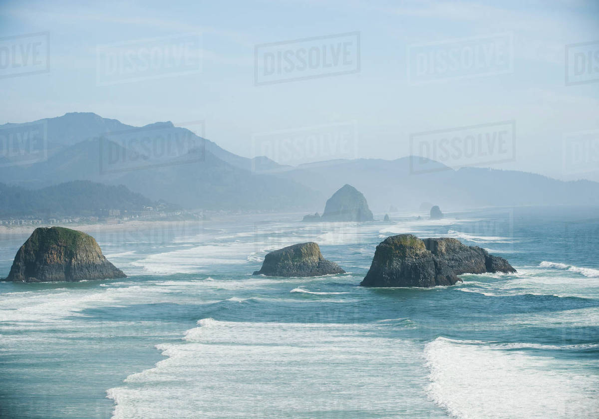 Rock formations in ocean - Stock Photo - Dissolve