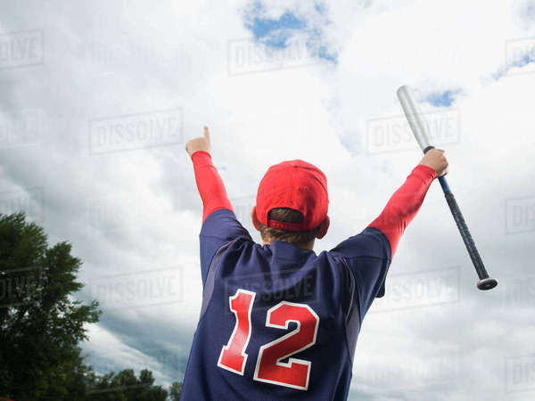 Baseball player celebrating with arms raised - Royalty-free Stock Photo ...