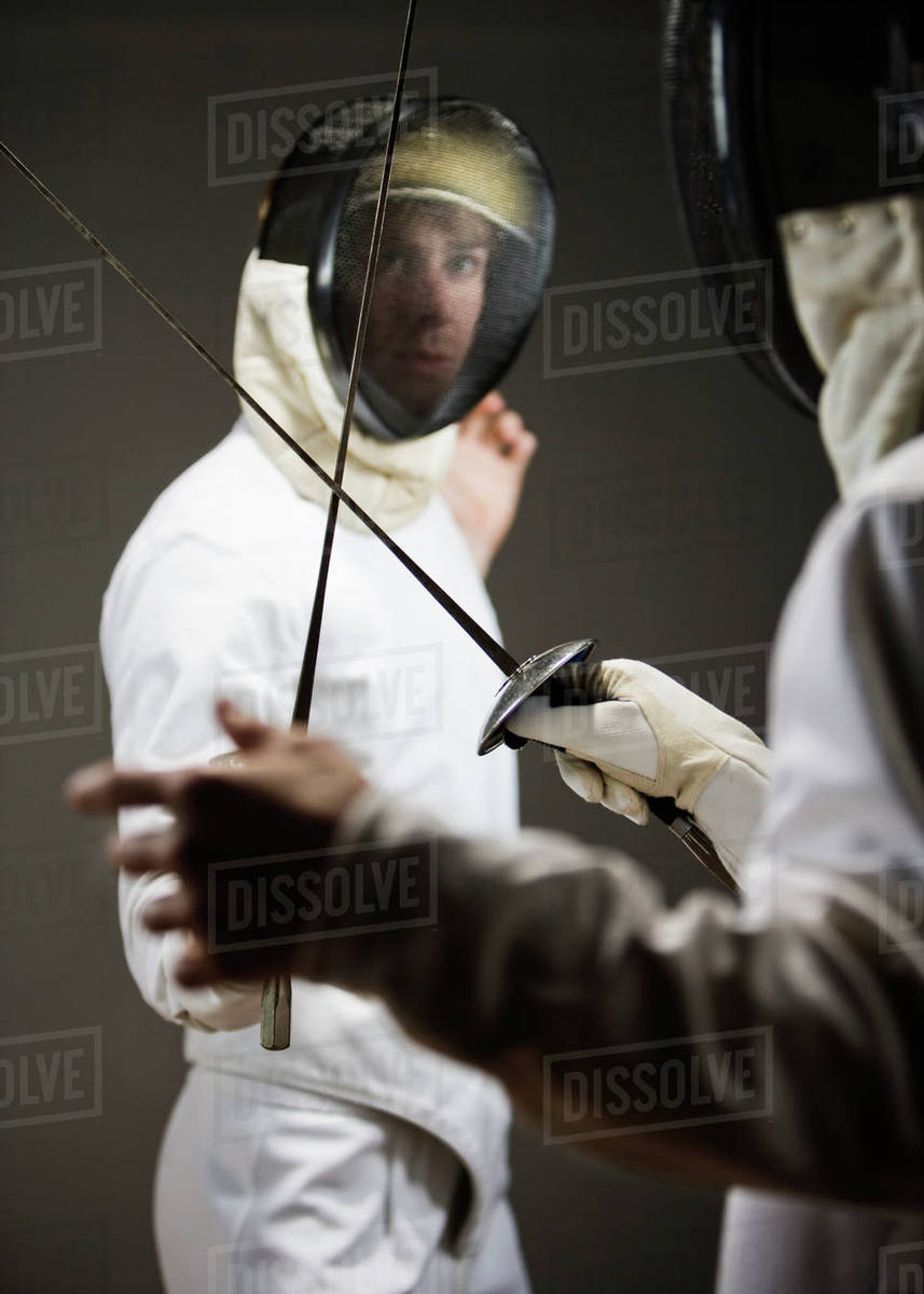 Men fencing - Royalty-free Stock Photo | Dissolve