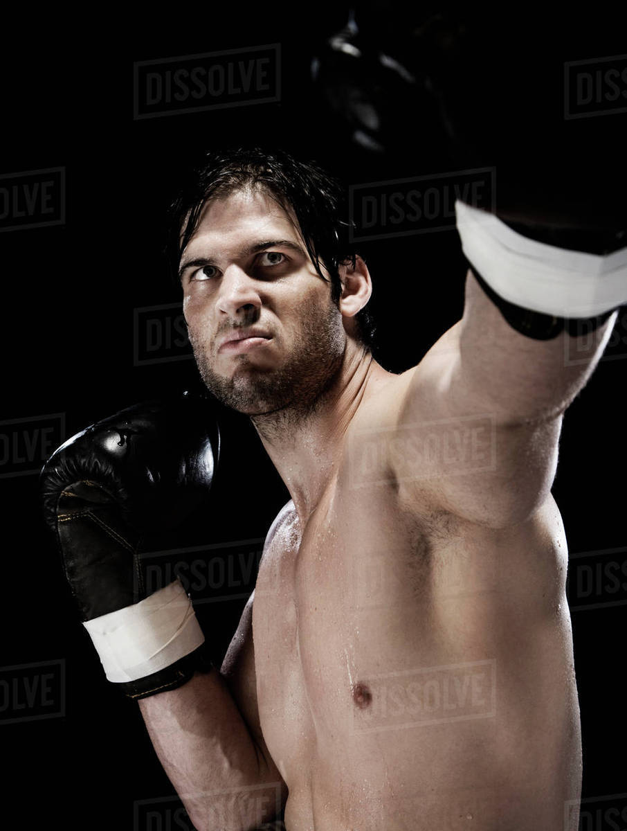 Close up of boxer in boxing stance - Stock Photo - Dissolve