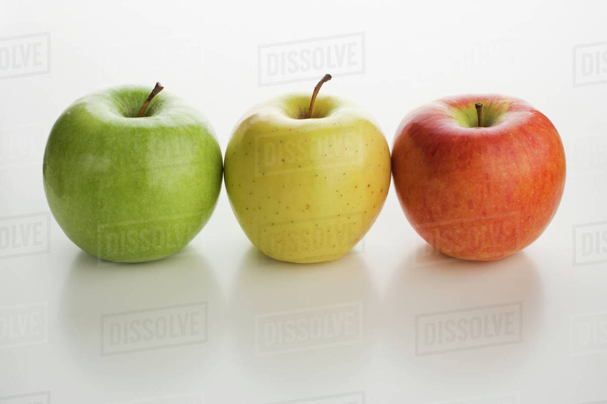 Assorted apples in a row - Stock Photo - Dissolve