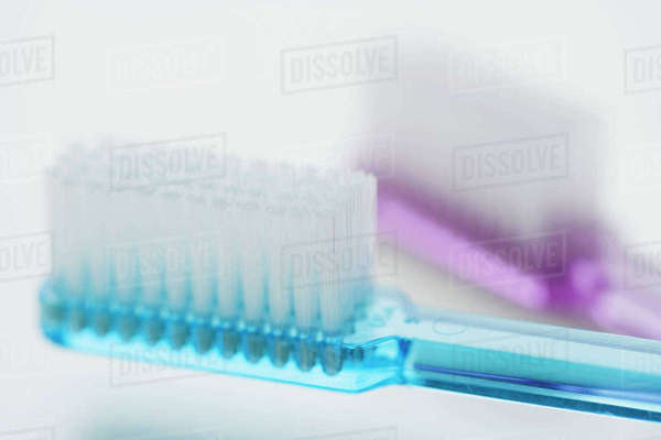 Close up of toothbrushes - Royalty-free Stock Photo | Dissolve